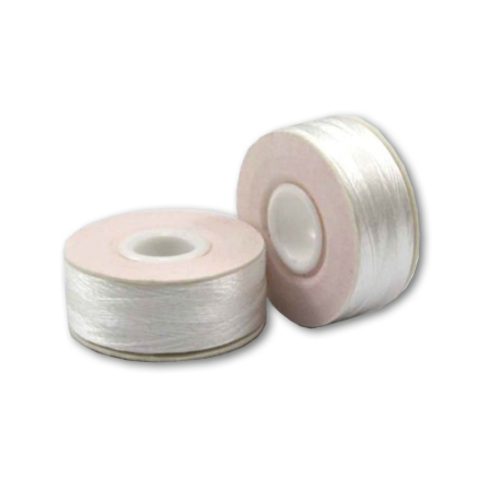 Pre-wound Paperside Bobbins — Twiga Industries Inc.